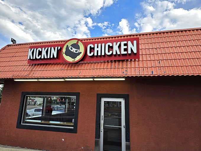 That cheerful chicken in sunglasses knows something you don't: the best fried chicken in Colorado is right here.
