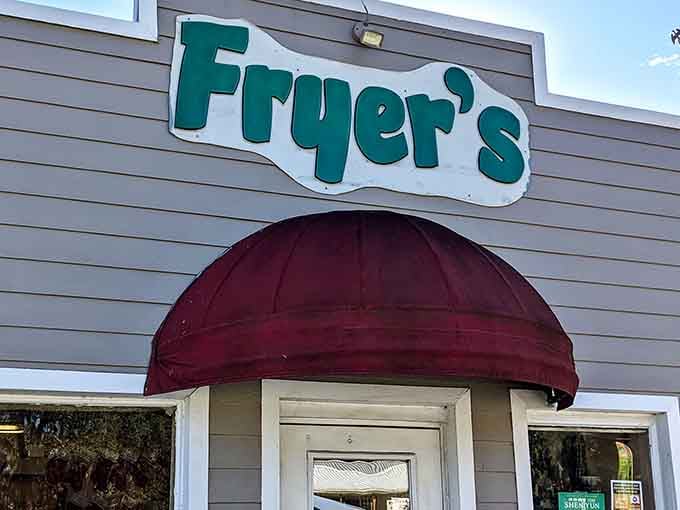 That burgundy awning is your beacon to fried chicken paradise in tiny Melrose, Florida.