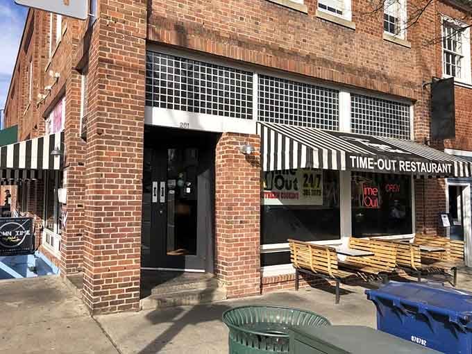That striped awning isn't just charming, it's your beacon to fried chicken paradise on East Franklin Street.