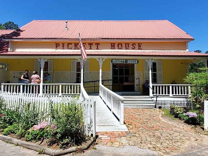 That red roof and welcoming porch aren't just charming, they're a beacon calling you to fried chicken paradise.