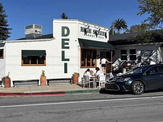 Small-town charm meets serious sandwich craftsmanship at this unassuming corner spot that locals guard like treasure.