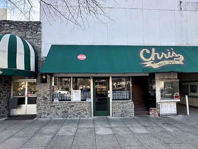The checkered curtains in those windows are like a time machine portal to when dining out meant something special and authentic.