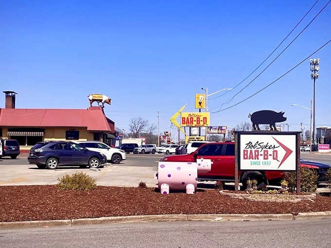 Multiple pigs standing guard means this place takes its pork seriously, and your taste buds should too.
