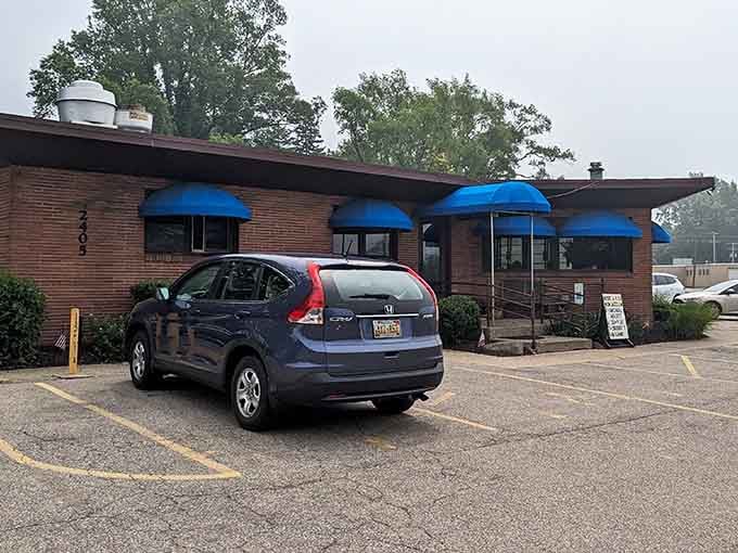 Those blue awnings aren't just for show, they're beacons guiding you to breakfast paradise in Fennville.
