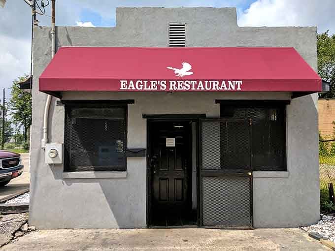 That red awning isn't just decoration, it's a beacon calling hungry souls to salvation one plate at a time.