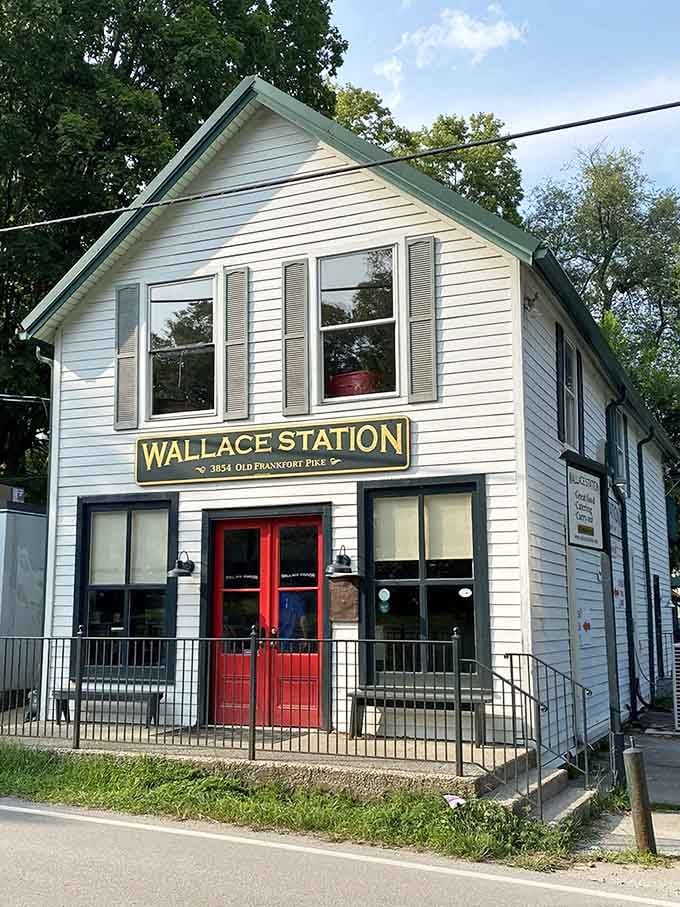 That charming white building with the red doors isn't just photogenic, it's your next lunch destination.