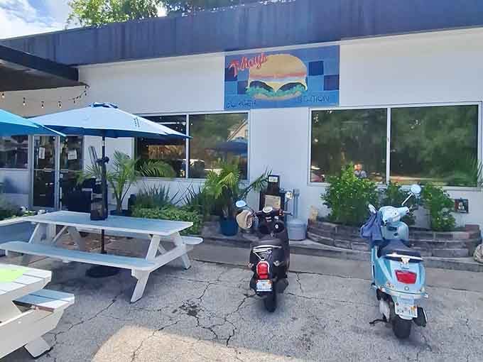 That burger mural isn't just decoration, it's a promise painted in primary colors and delivered with every order.