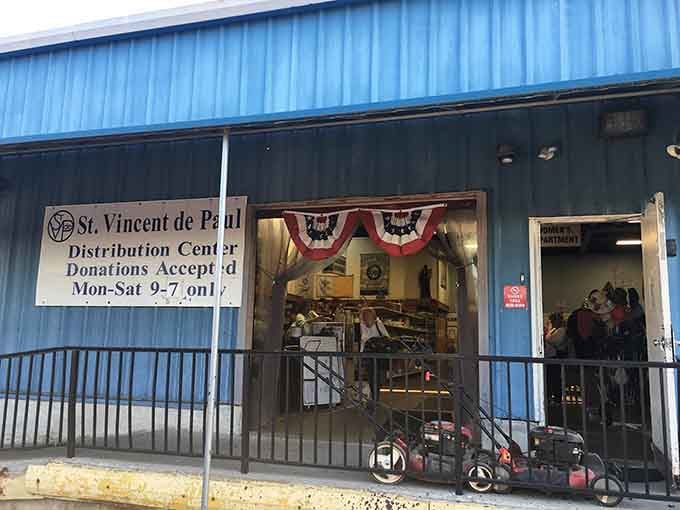 That blue corrugated exterior hides more treasures than a pirate's chest, and the patriotic bunting adds hometown charm.