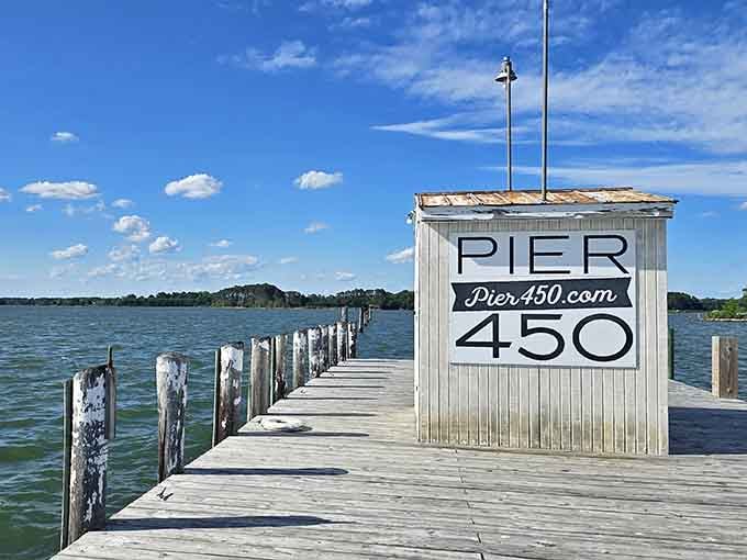 That wooden pier stretching into blue perfection is your gateway to fresh seafood and even fresher Potomac breezes.