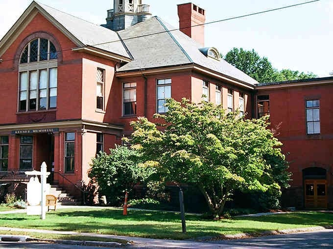 The Keeney Memorial stands proud in brick and history, looking exactly like the kind of building where important decisions get made.