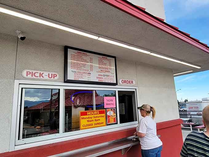 The classic walk-up window where burger dreams come true, one paper-wrapped package at a time.