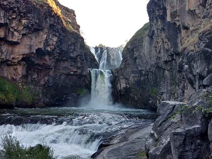 Two tiers of pure Oregon magic tumbling over ancient basalt like nature's own grand staircase.