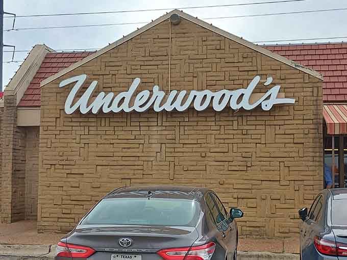 That classic script sign isn't just marking a building, it's pointing you toward your next great meal.