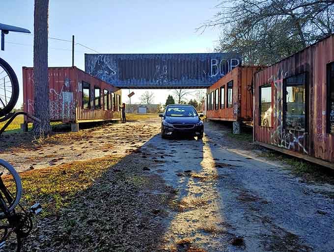 Your car becomes the gallery as you roll through this artistic tunnel, where rust and creativity merge beautifully.