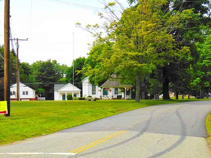 Wide open spaces and historic buildings create a scene that belongs on a postcard, not a highway billboard.