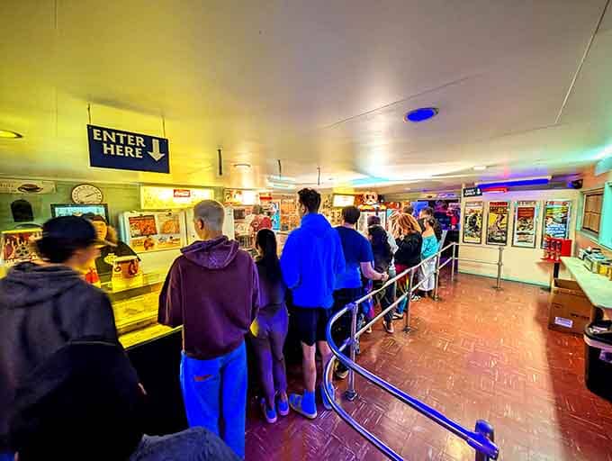 The line at the snack bar during intermission is half the fun, like a tailgate party where everyone's rooting for good cinema.