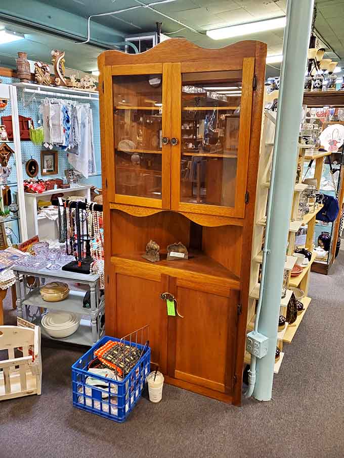 This gorgeous wooden cabinet with glass doors could be the statement piece your dining room never knew it needed.