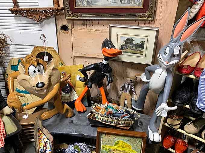 Daffy Duck and Bugs Bunny frozen mid-argument, probably debating whether they belong in an antique mall.