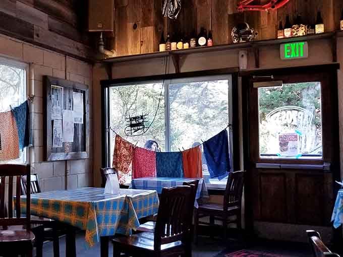 Colorful bandanas and natural light streaming through windows add character to every corner of this space.