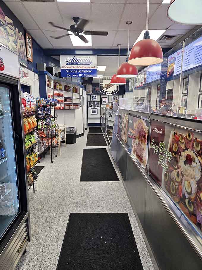 Red pendant lights guide you toward deli counter nirvana and the sandwich of your dreams.