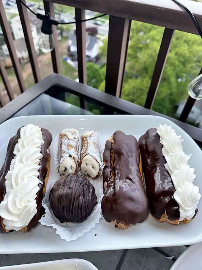 Cannoli and cream-filled pastries lined up like edible soldiers ready to storm your taste buds with joy.