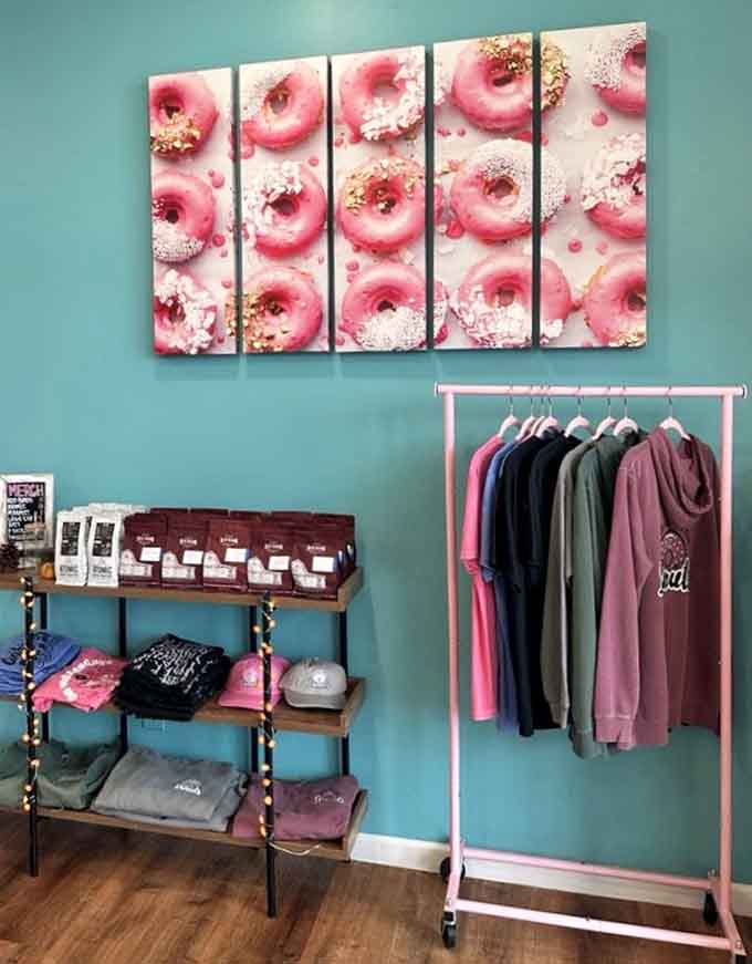 The merchandise wall where you can literally wear your love for donuts with pride and style.