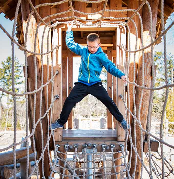 Rope tunnels challenge climbers to navigate suspended passages, building confidence with every carefully placed hand and foot.
