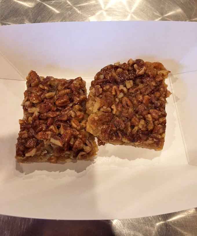 Pecan bars sitting pretty, ready to provide the sweet finale your barbecue feast absolutely deserves right now.