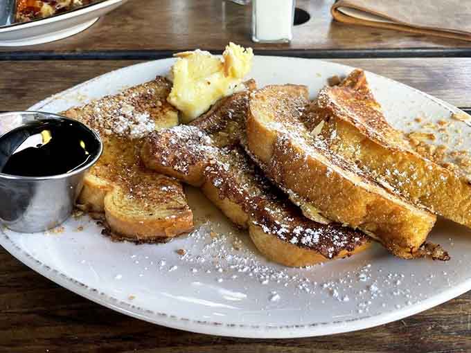 Classic French toast dusted with powdered sugar and butter, because some mornings call for pure, unapologetic sweetness.