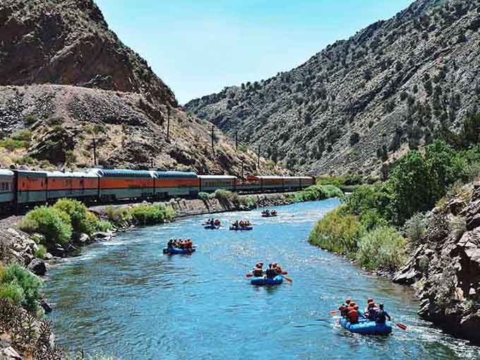 Where else can you watch rafters navigate rapids while dining on a scenic train ride simultaneously?