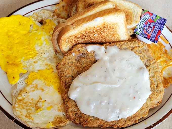Country fried steak with eggs and gravy: because sometimes you need breakfast to remind you that life is good.