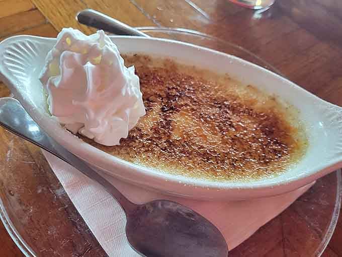 Cr&egrave;me br&ucirc;l&eacute;e with that perfect caramelized top, because even train-themed restaurants know how to stick the landing.