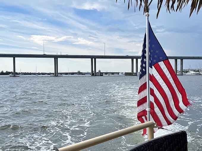 Stars and Stripes flutter proudly as the iconic bridge rises in the distance, reminding you this adventure is pure Americana.