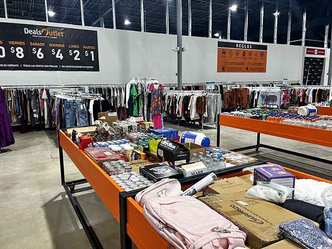 Clothing racks line the walls while bins overflow with possibilities, proving variety really is the spice of savings.