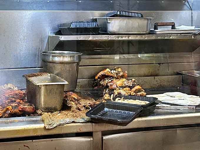 Watch the magic happen as skilled hands transform fresh chicken into the crispy masterpieces you're about to devour.