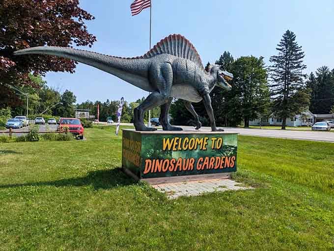 The Spinosaurus stands guard at the entrance, making sure everyone knows they've arrived somewhere truly special.