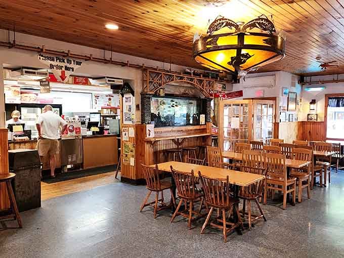 The dining room features nautical touches and that incredible mural that makes every meal feel like a vacation.