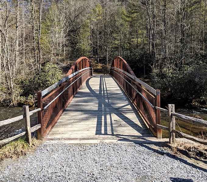 This charming bridge leads you deeper into DuPont State Forest where waterfalls await your hiking boots and camera.