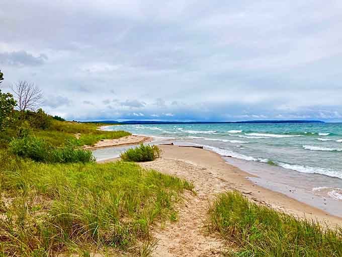 Dramatic skies meet emerald waters along this wild shoreline, where Mother Nature shows off her moody side beautifully.