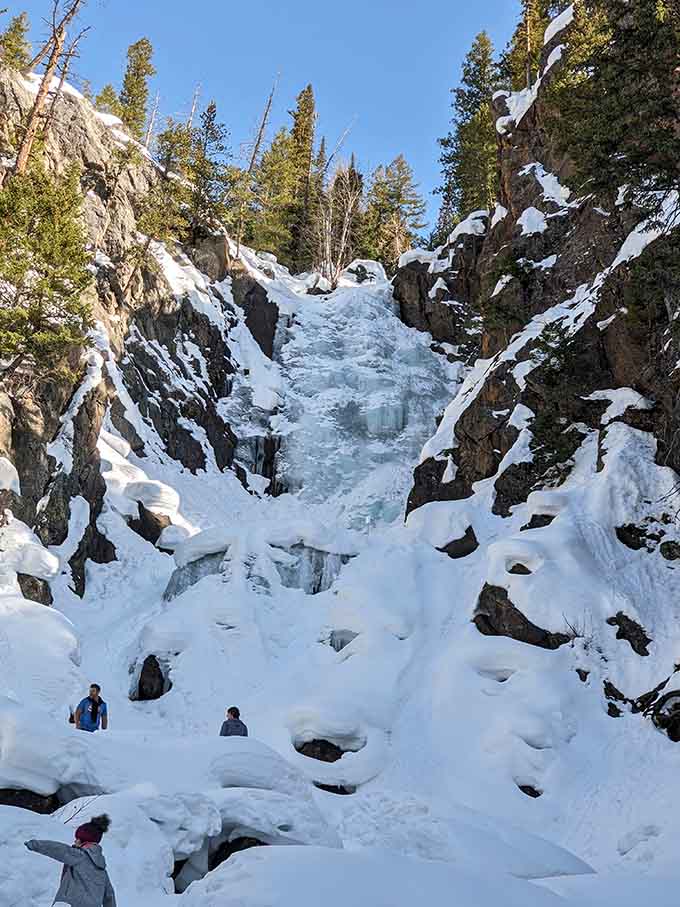 Winter turns the cascade into frozen sculpture, proving that water has an artistic side when temperatures drop.