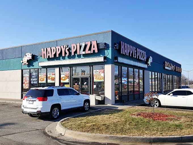 That retro signage and cheerful colors promise exactly what you need: hot pizza and zero pretension whatsoever.
