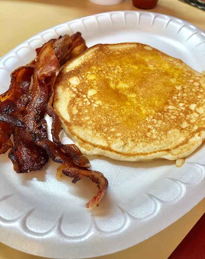 Golden pancakes with crispy bacon: sometimes the classics need no improvement, just proper execution and appreciation.