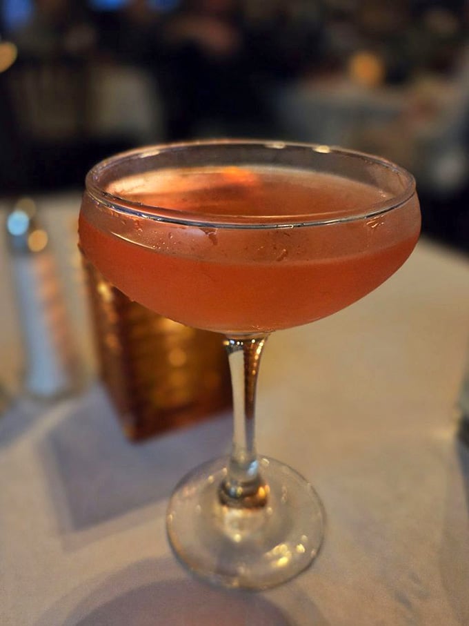 Craft cocktails in coupe glasses mean this steakhouse takes its bar program as seriously as its beef.