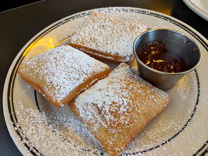 Beignets dusted with powdered sugar prove that dessert doesn't need to be complicated to be absolutely perfect.