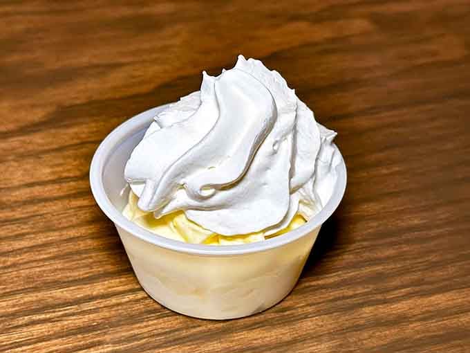 Soft serve ice cream swirled high because every great meal deserves a sweet, creamy happy ending.