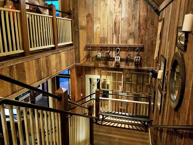 Multi-level design adds architectural interest while maintaining that cozy barn feel throughout the space.