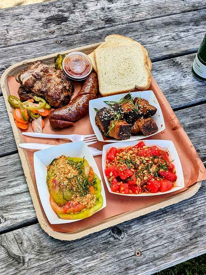 This platter showcases the full range: smoked meats, creative sides, and enough variety to make decisions impossible.