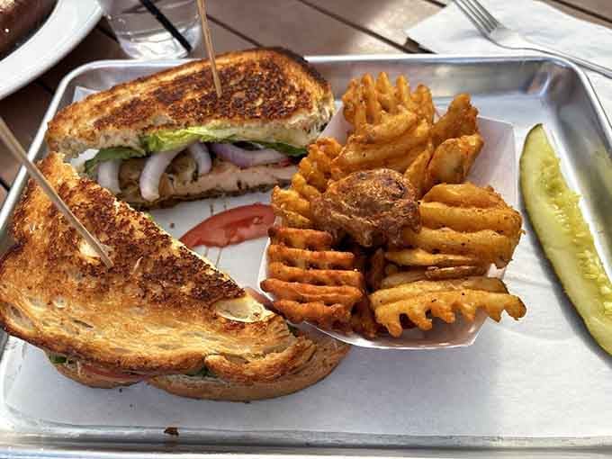 The Blackened Chicken Sandwich with waffle fries hits that perfect sweet spot between indulgent and satisfying completely.