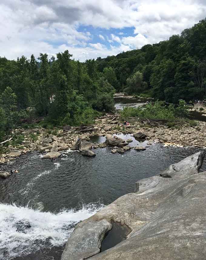 The river continues its journey downstream, having put on quite the show at the falls.