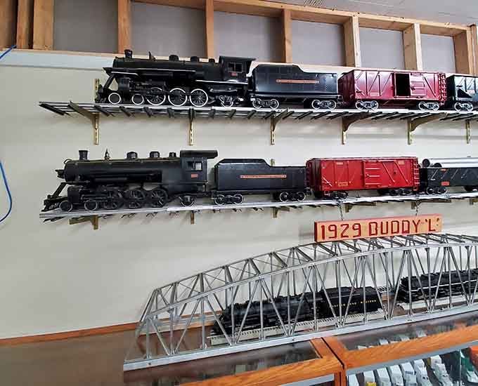 Model train enthusiasts will appreciate this colorful collection that celebrates railroading history in miniature form.